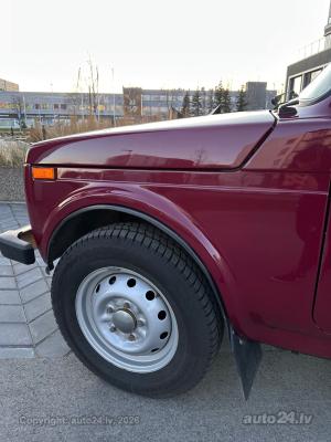 Sarkans Lada Niva 2005 Tallina, ar dzinēja tilpumu 1.70 L un nobraukumu 60 tūkst. km par 3599 €, foto 29 vietnē AUTOMOTO.COM.LV