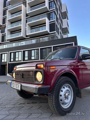 Sarkans Lada Niva 2005 Tallina, ar dzinēja tilpumu 1.70 L un nobraukumu 60 tūkst. km par 3599 €, foto 30 vietnē AUTOMOTO.COM.LV
