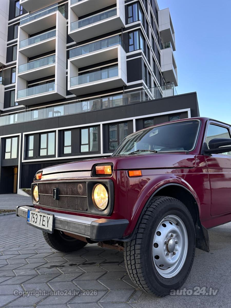 Sarkans Lada Niva 2005 Tallina, ar dzinēja tilpumu 1.70 L un nobraukumu 60 tūkst. km par 3599 €, foto 30 vietnē AUTOMOTO.COM.LV