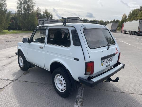 Белый Лада Niva 2002 в Шяуляй, объемом двигателя 1.70 л и пробегом 74 тыс. км за 1900 €, фото 4 на AUTOMOTO.COM.LV