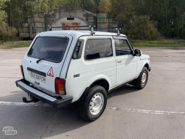 Белый Лада Niva 2002 в Шяуляй, объемом двигателя 1.70 л и пробегом 74 тыс. км за 1900 €, фото 6 на AUTOMOTO.COM.LV