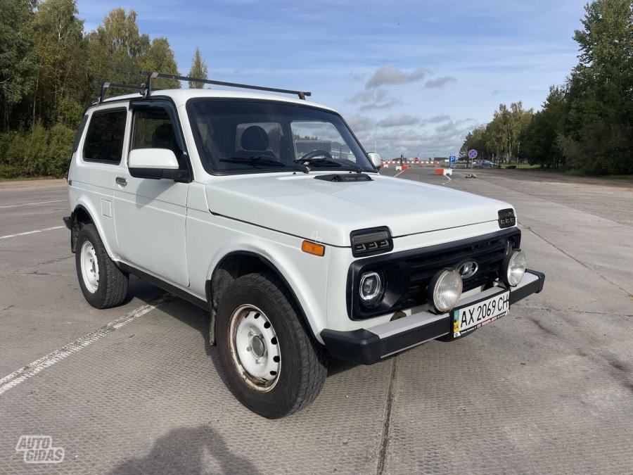 Белый Лада Niva 2002 в Шяуляй, объемом двигателя 1.70 л и пробегом 74 тыс. км за 1900 €, фото 8 на AUTOMOTO.COM.LV