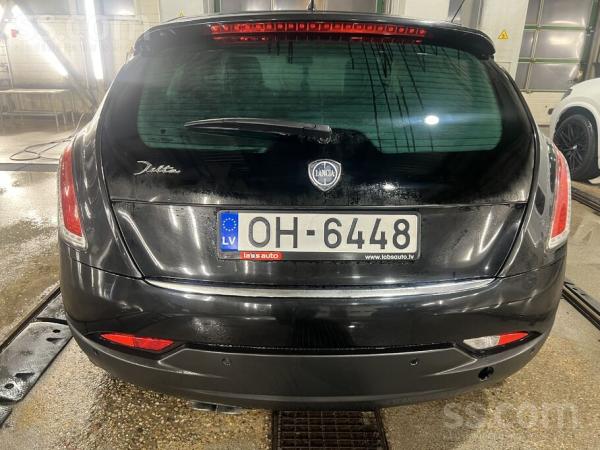 Black Lancia Delta 2010 in Riga, with an engine capacity of 1.90 L and mileage of 244 thousand km for 2900 €, photo 2 on AUTOMOTO.COM.LV