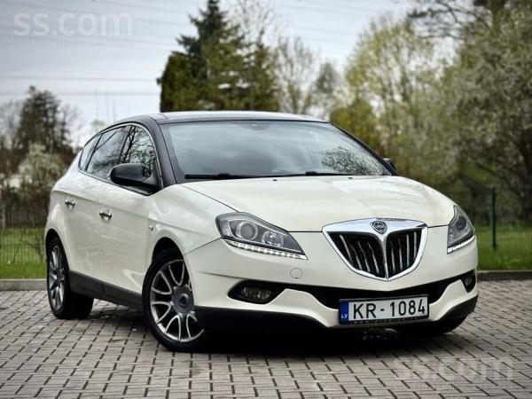 White Lancia Delta 2009 in Riga, with an engine capacity of 1.60 L and mileage of 216 thousand km for 3200 €, photo 1 on AUTOMOTO.COM.LV
