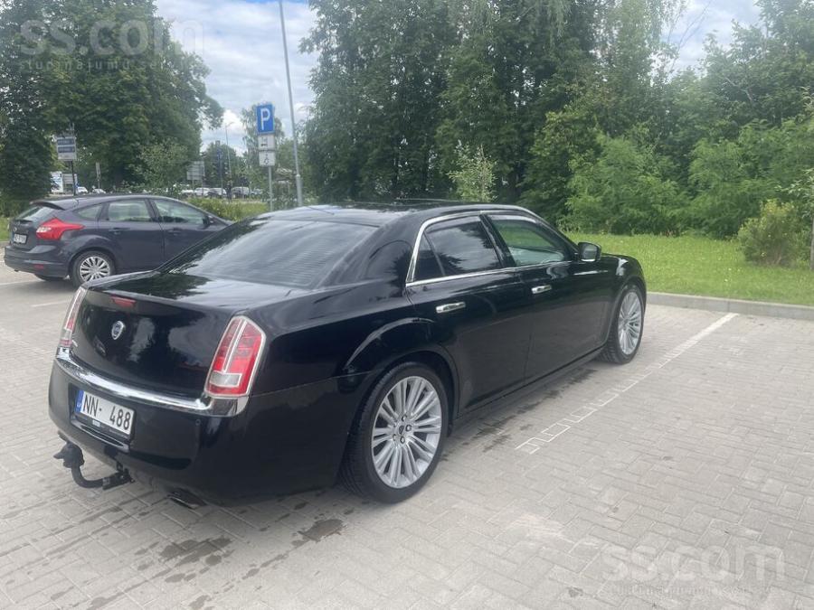 Melns Lancia Thema 2011 Jelgava, ar dzinēja tilpumu 3.00 L un nobraukumu 388 tūkst. km par 6000 €, foto 6 vietnē AUTOMOTO.COM.LV