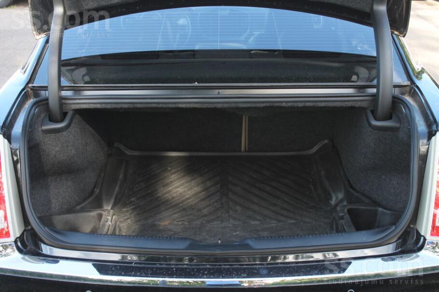 Black Lancia Thema 2013 in Riga, with an engine capacity of 3.00 L and mileage of 94 thousand km for 14900 €, photo 9 on AUTOMOTO.COM.LV