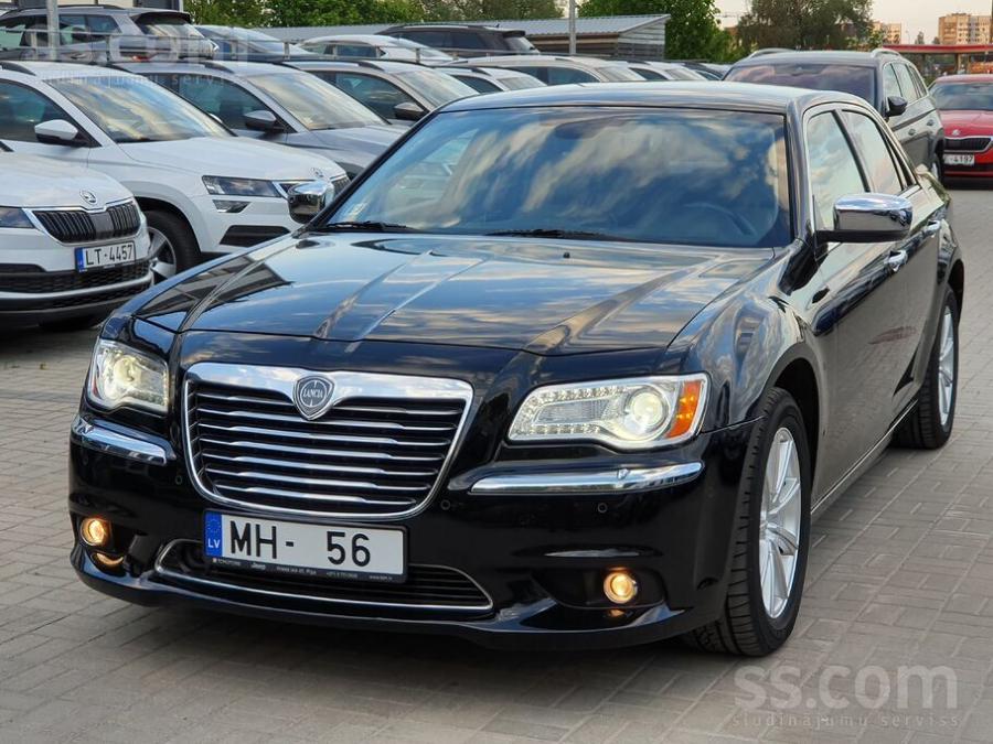 Black Lancia Thema 2013 in Riga, with an engine capacity of 3.00 L and mileage of 94 thousand km for 14900 €, photo 34 on AUTOMOTO.COM.LV