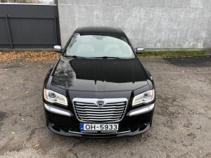 Black Lancia Thema 2013 in Riga, with an engine capacity of 3.00 L and mileage of 227 thousand km for 8550 €, photo  on AUTOMOTO.COM.LV