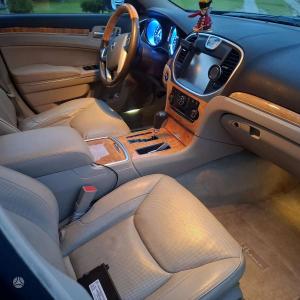 Black Lancia Thema 2013 in Kaunas, with an engine capacity of 3.00 L and mileage of 215 thousand km for 6900 €, photo 22 on AUTOMOTO.COM.LV