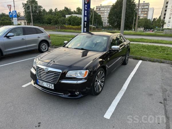 Brown Lancia Thema 2012 in Riga, with an engine capacity of 3.00 L and mileage of 220 thousand km for 5950 €, photo 1 on AUTOMOTO.COM.LV