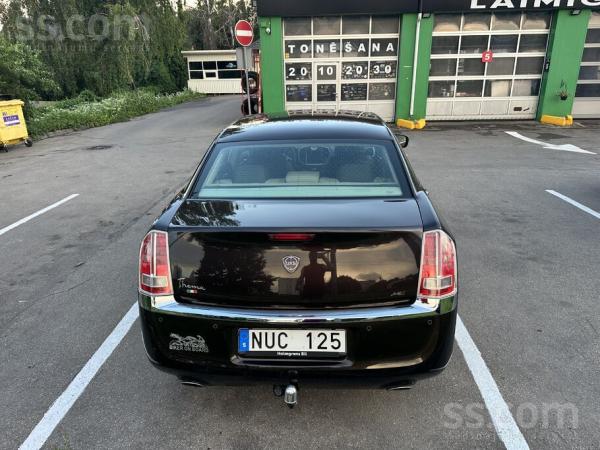 Brown Lancia Thema 2012 in Riga, with an engine capacity of 3.00 L and mileage of 220 thousand km for 5950 €, photo 5 on AUTOMOTO.COM.LV