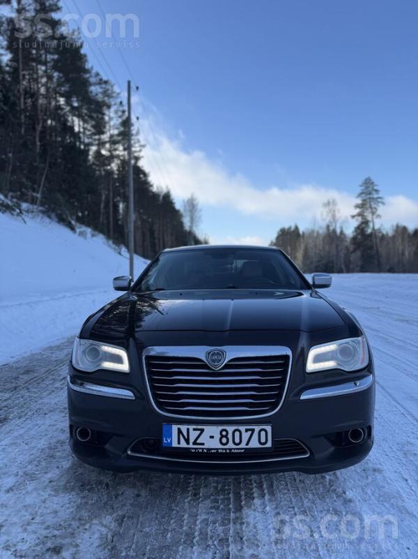 Brown Lancia Thema 2013 in Riga, with an engine capacity of 3.00 L and mileage of 338 thousand km for 6200 €, photo 2 on AUTOMOTO.COM.LV