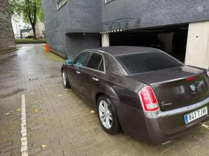 Brūns Lancia Thema 2013 Tallina, ar dzinēja tilpumu 2.99 L un nobraukumu 270 tūkst. km par 6490 €, foto  vietnē AUTOMOTO.COM.LV
