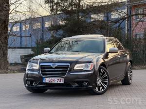 Sarkans Lancia Thema 2012 Rīga, ar dzinēja tilpumu 3.00 L un nobraukumu 0 tūkst. km par 8450 €, foto  vietnē AUTOMOTO.COM.LV