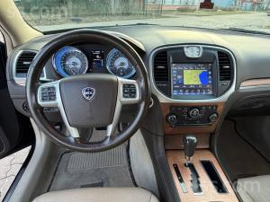 Red Lancia Thema 2012 in Riga, with an engine capacity of 3.00 L and mileage of 0 thousand km for 8450 €, photo 26 on AUTOMOTO.COM.LV