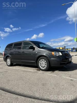 Black Lancia Voyager 2012 in Riga, with an engine capacity of 2.80 L and mileage of 240 thousand km for 4700 €, photo  on AUTOMOTO.COM.LV