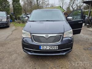 Black Lancia Voyager 2013 in Riga, with an engine capacity of 2.80 L and mileage of 0 thousand km for 8500 €, photo  on AUTOMOTO.COM.LV