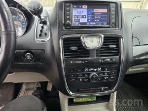 Black Lancia Voyager 2013 in Riga, with an engine capacity of 2.80 L and mileage of 0 thousand km for 8500 €, photo 13 on AUTOMOTO.COM.LV