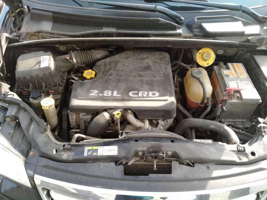 Black Lancia Voyager 2013 in Vilnius, with an engine capacity of 2.80 L and mileage of 196 thousand km for 4790 €, photo 11 on AUTOMOTO.COM.LV