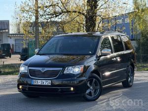 Melns Lancia Voyager 2014 Rīga, ar dzinēja tilpumu 2.80 L un nobraukumu 0 tūkst. km par 8750 €, foto  vietnē AUTOMOTO.COM.LV