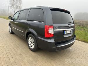 Blue Lancia Voyager 2014 in Riga, with an engine capacity of 2.80 L and mileage of 272 thousand km for 8399 €, photo 7 on AUTOMOTO.COM.LV