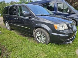 Grey Lancia Voyager 2011 in Riga, with an engine capacity of 2.80 L and mileage of 0 thousand km for 8500 €, photo 3 on AUTOMOTO.COM.LV