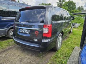 Grey Lancia Voyager 2011 in Riga, with an engine capacity of 2.80 L and mileage of 0 thousand km for 8500 €, photo 4 on AUTOMOTO.COM.LV