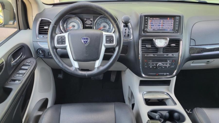 Pelēks Lancia Voyager 2012 Rīga, ar dzinēja tilpumu 2.80 L un nobraukumu 224 tūkst. km par 8550 €, foto 19 vietnē AUTOMOTO.COM.LV