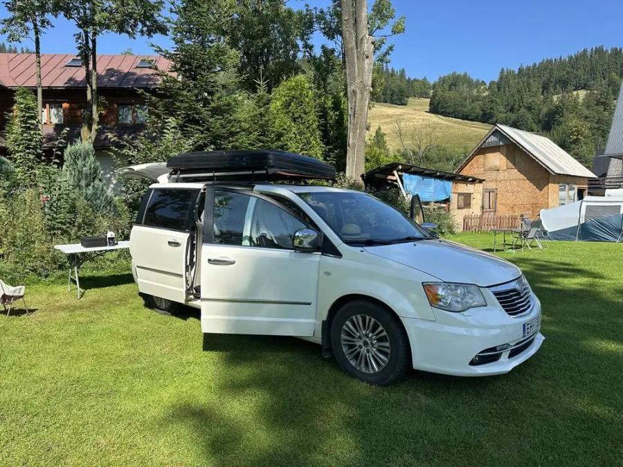 Grey Lancia Voyager 2013 in Talsi, with an engine capacity of 2.80 L and mileage of 270 thousand km for 11200 €, photo 22 on AUTOMOTO.COM.LV