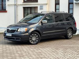 Grey Lancia Voyager 2014 in Riga, with an engine capacity of 2.80 L and mileage of 239 thousand km for 9750 €, photo 12 on AUTOMOTO.COM.LV