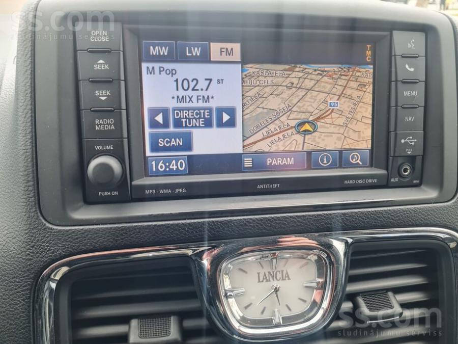 Grey Lancia Voyager 2015 in Jelgava, with an engine capacity of 2.80 L and mileage of 0 thousand km for 10490 €, photo 24 on AUTOMOTO.COM.LV