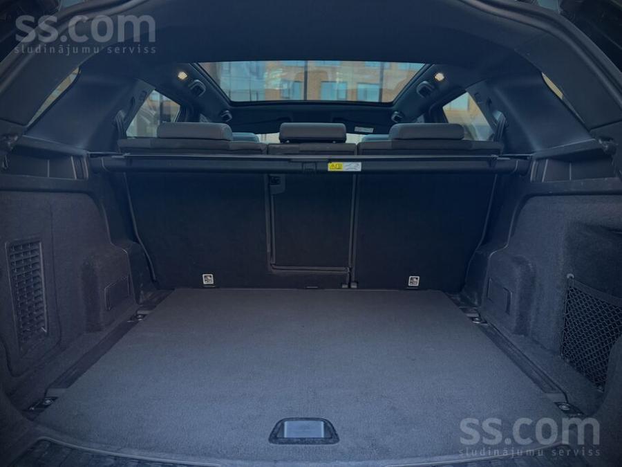 Black Land Rover Discovery Sport 2021 in Riga, with an engine capacity of 2.00 L and mileage of 166 thousand km for 26650 €, photo 35 on AUTOMOTO.COM.LV