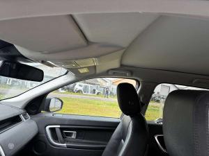 Grey Land Rover Discovery Sport 2017 in Panevezys, with an engine capacity of 2.00 L and mileage of 180 thousand km for 7700 €, photo 14 on AUTOMOTO.COM.LV