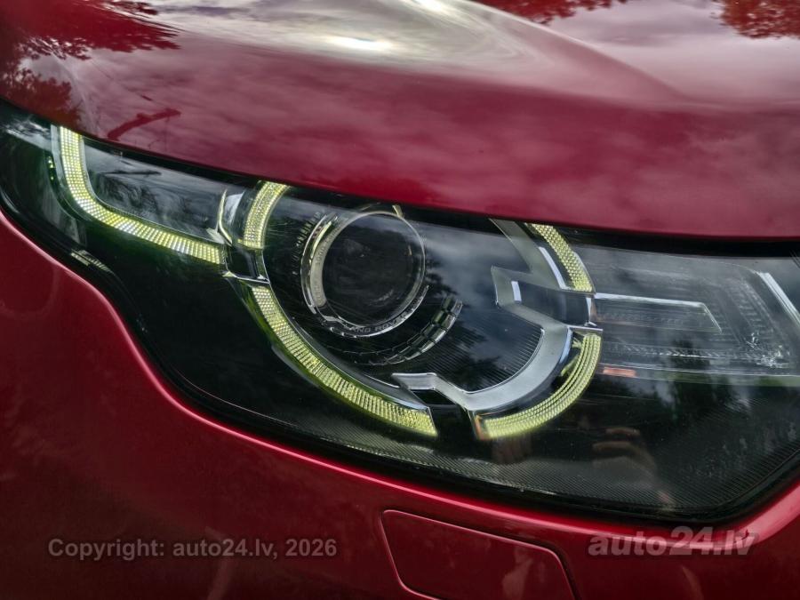 Red Land Rover Discovery Sport 2016 in Tallinn, with an engine capacity of 2.00 L and mileage of 124 thousand km for 10990 €, photo 24 on AUTOMOTO.COM.LV
