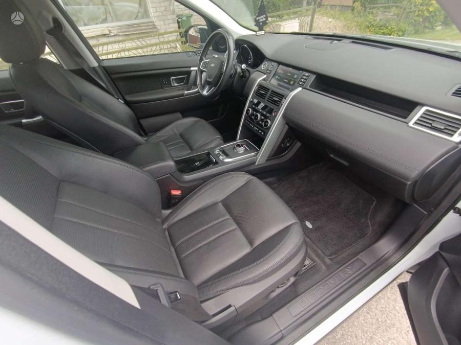 White Land Rover Discovery Sport 2015 in Kaunas, with an engine capacity of 2.18 L and mileage of 288 thousand km for 11300 €, photo 14 on AUTOMOTO.COM.LV