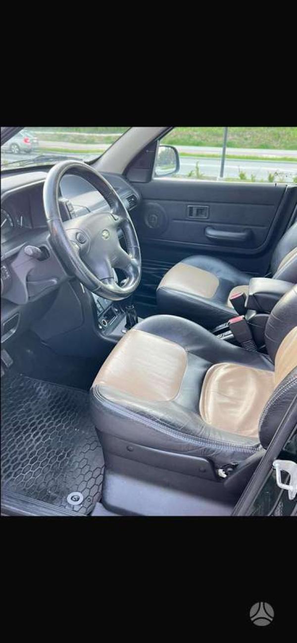 Zaļš Land Rover Freelander 2004 Viļņa, ar dzinēja tilpumu 1.95 L un nobraukumu 262 tūkst. km par 1850 €, foto 5 vietnē AUTOMOTO.COM.LV