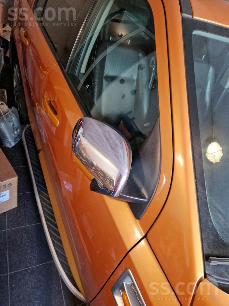 Orange Land Rover Freelander 2007 in Riga, with an engine capacity of 3.20 L and mileage of 273 thousand km for 2600 €, photo 3 on AUTOMOTO.COM.LV