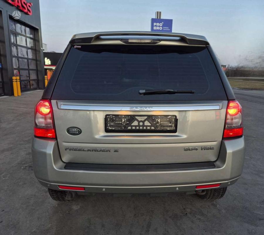 Yellow Land Rover Freelander 2012 in Panevezys, with an engine capacity of 2.18 L and mileage of 265 thousand km for 2999 €, photo 5 on AUTOMOTO.COM.LV