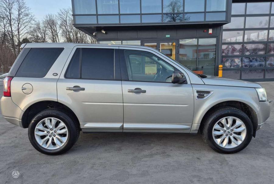 Yellow Land Rover Freelander 2012 in Panevezys, with an engine capacity of 2.18 L and mileage of 265 thousand km for 2999 €, photo 7 on AUTOMOTO.COM.LV