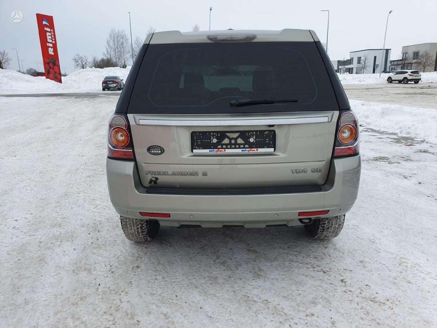 Yellow Land Rover Freelander 2014 in Siauliai, with an engine capacity of 2.20 L and mileage of 243 thousand km for 9700 €, photo 7 on AUTOMOTO.COM.LV