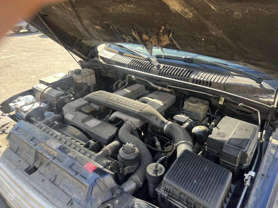 Zils Land Rover Range Rover 1998 Panevēža, ar dzinēja tilpumu 2.50 L un nobraukumu 385 tūkst. km par 2650 €, foto 13 vietnē AUTOMOTO.COM.LV