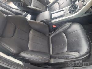 Black Land Rover Range Rover Evoque 2015 in Riga, with an engine capacity of 2.00 L and mileage of 0 thousand km for 16755 €, photo 16 on AUTOMOTO.COM.LV