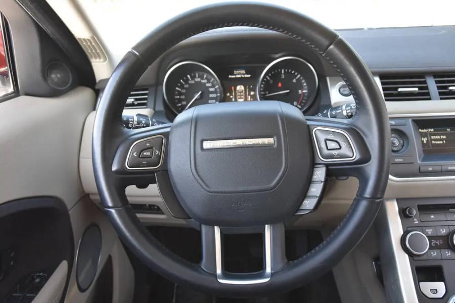 Red Land Rover Range Rover Evoque 2012 in Marupe, with an engine capacity of 2.20 L and mileage of 293 thousand km for 8750 €, photo 14 on AUTOMOTO.COM.LV