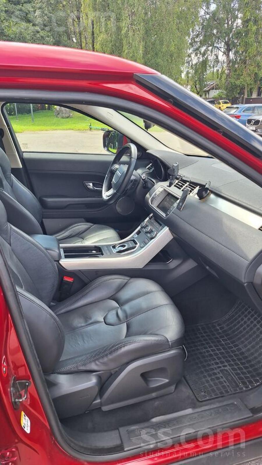 Red Land Rover Range Rover Evoque 2013 in Riga, with an engine capacity of 2.20 L and mileage of 128 thousand km for 11800 €, photo 8 on AUTOMOTO.COM.LV