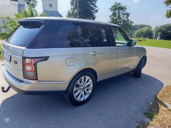 Yellow Land Rover Range Rover 2013 in Kaunas, with an engine capacity of 4.37 L and mileage of 275 thousand km for 23500 €, photo 3 on AUTOMOTO.COM.LV