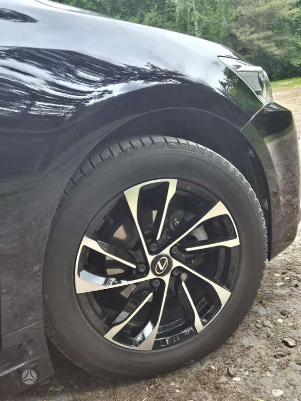 Black Lexus CT 200h 2014 in Vilnius, with an engine capacity of 1.80 L and mileage of 253 thousand km for 10999 €, photo 9 on AUTOMOTO.COM.LV