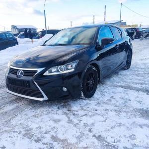 Black Lexus CT 200h 2015 in Vilnius, with an engine capacity of 1.80 L and mileage of 280 thousand km for 10400 €, photo 3 on AUTOMOTO.COM.LV