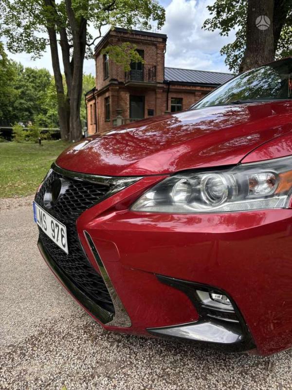 Red Lexus CT 200h 2012 in Panevezys, with an engine capacity of 1.80 L and mileage of 107 thousand km for 9500 €, photo 4 on AUTOMOTO.COM.LV