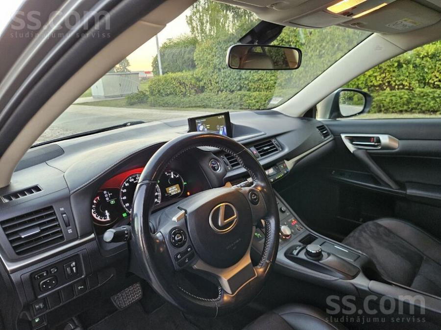 Grey Lexus CT 2015 in Riga, with an engine capacity of 1.80 L and mileage of 107 thousand km for 12200 €, photo 12 on AUTOMOTO.COM.LV