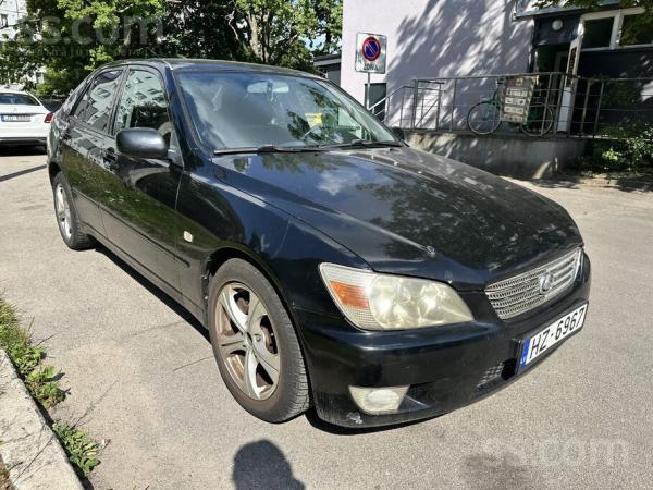 Black Lexus IS 1999 in Riga, with an engine capacity of 2.00 L and mileage of 258 thousand km for 1200 €, photo 2 on AUTOMOTO.COM.LV